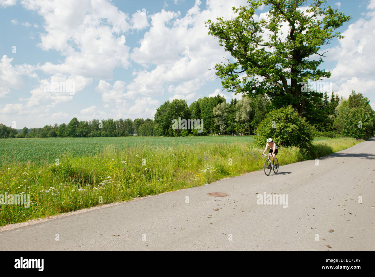 Female cyclist with cyclo-cross road bike Stock Photo - Alamy