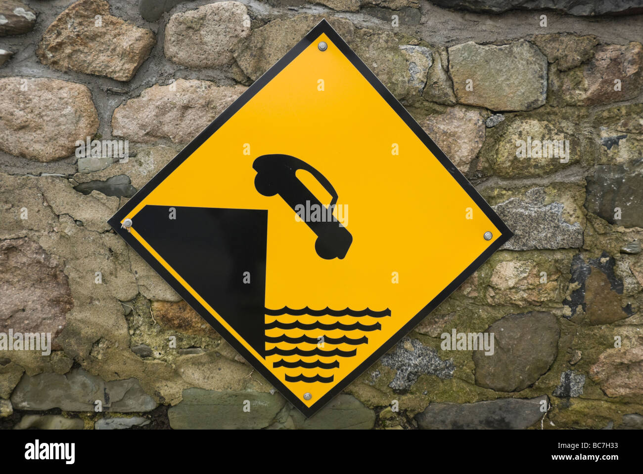 Warning sign on east coast of Ireland Stock Photo - Alamy