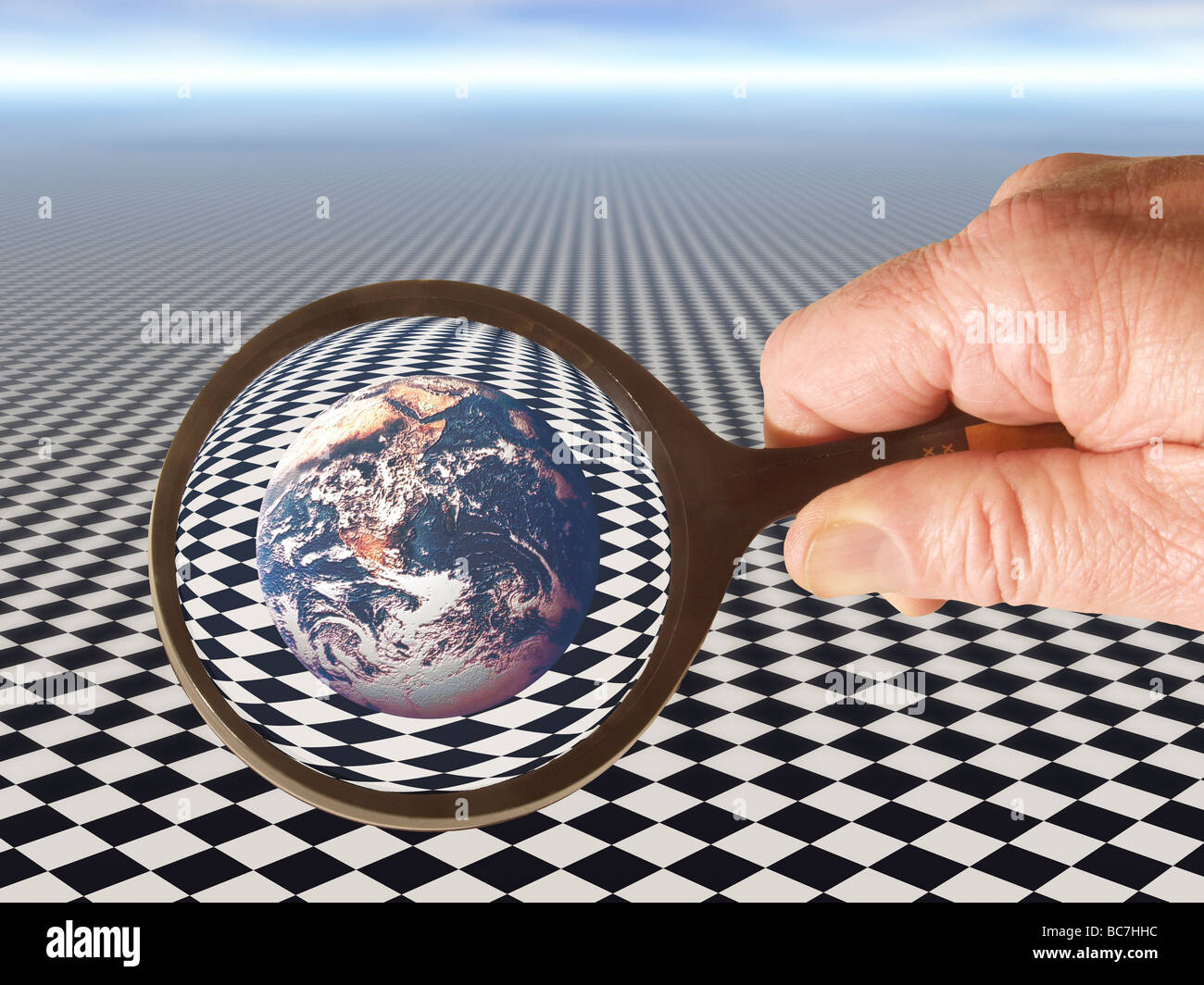 The earth under a magnifying glass Stock Photo - Alamy