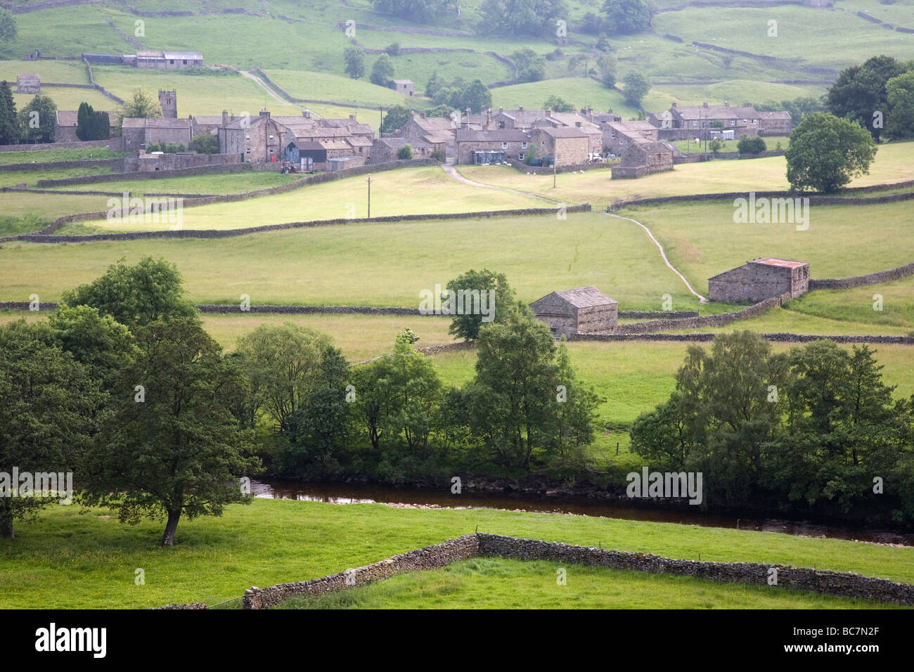 View across the fields to Muker Village Swaledale Yorkshire Dales ...