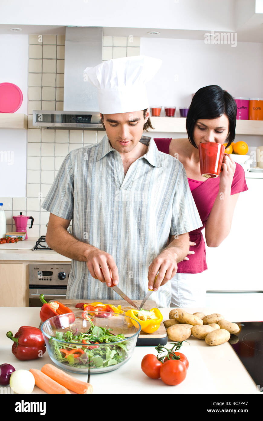 couple cooking dinner together Stock Photo - Alamy