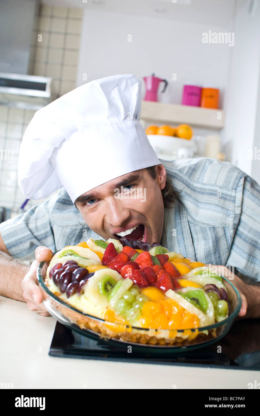 man with fruit cake Stock Photo - Alamy