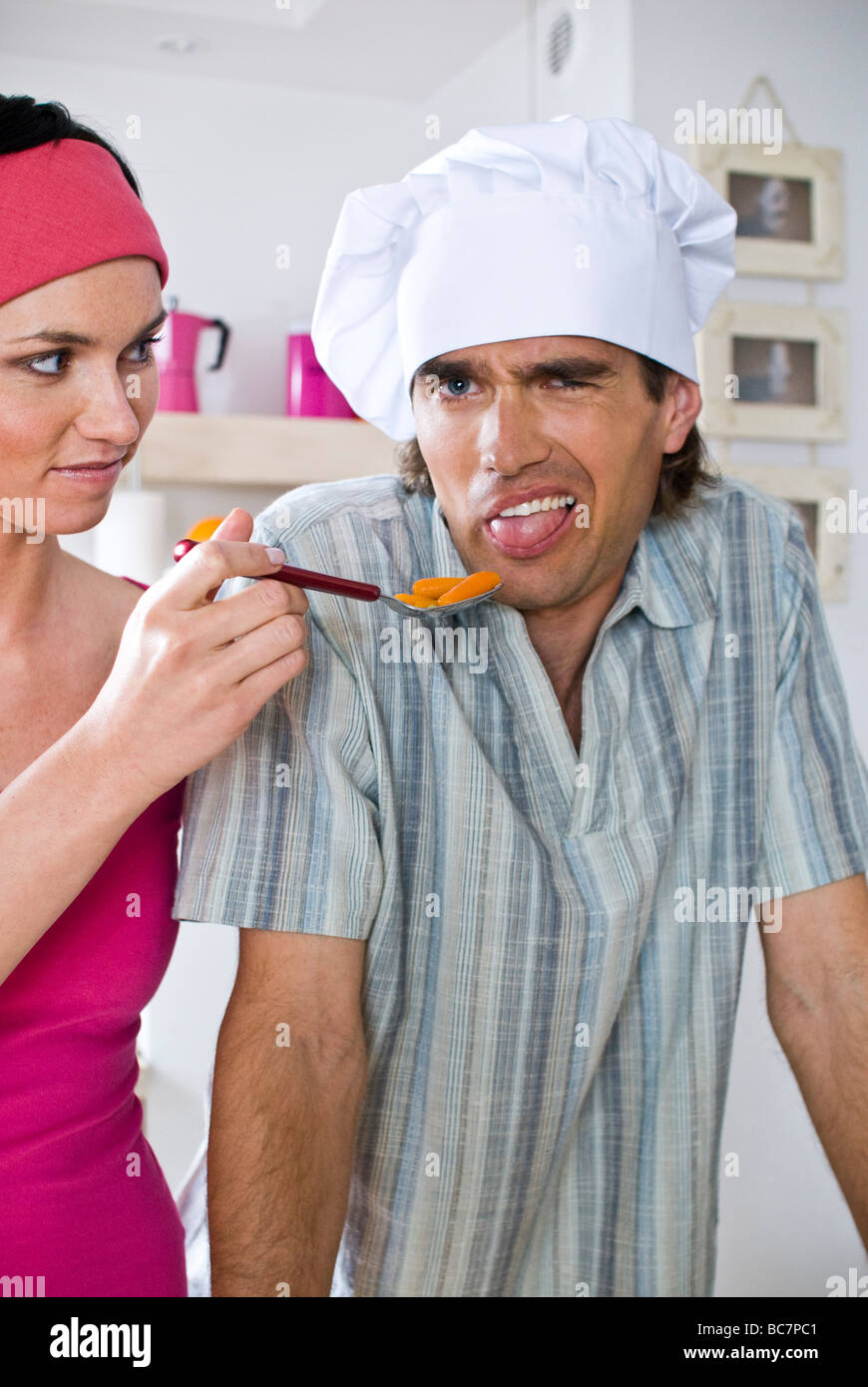 woman feeding man Stock Photo - Alamy