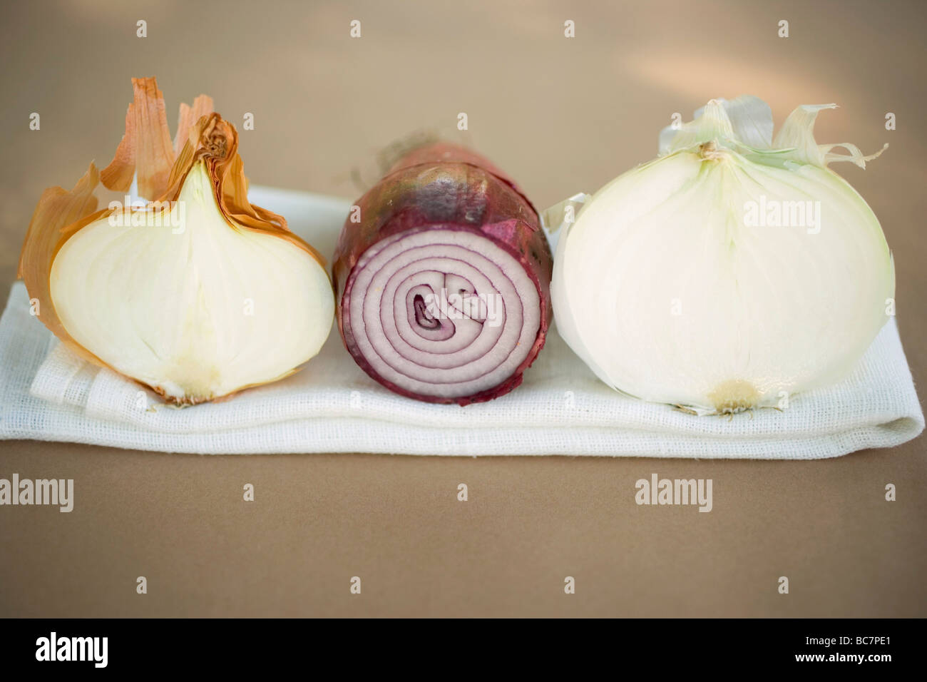 Three different onions, showing cut surfaces Stock Photo - Alamy
