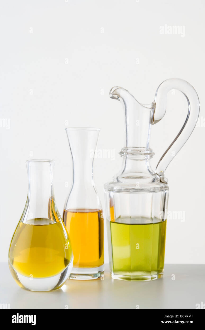 Three different types of oil in carafes Stock Photo - Alamy