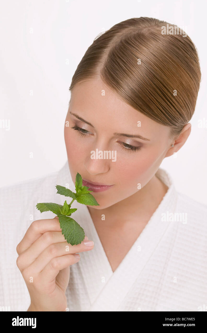 Woman smelling mentha hi-res stock photography and images - Alamy