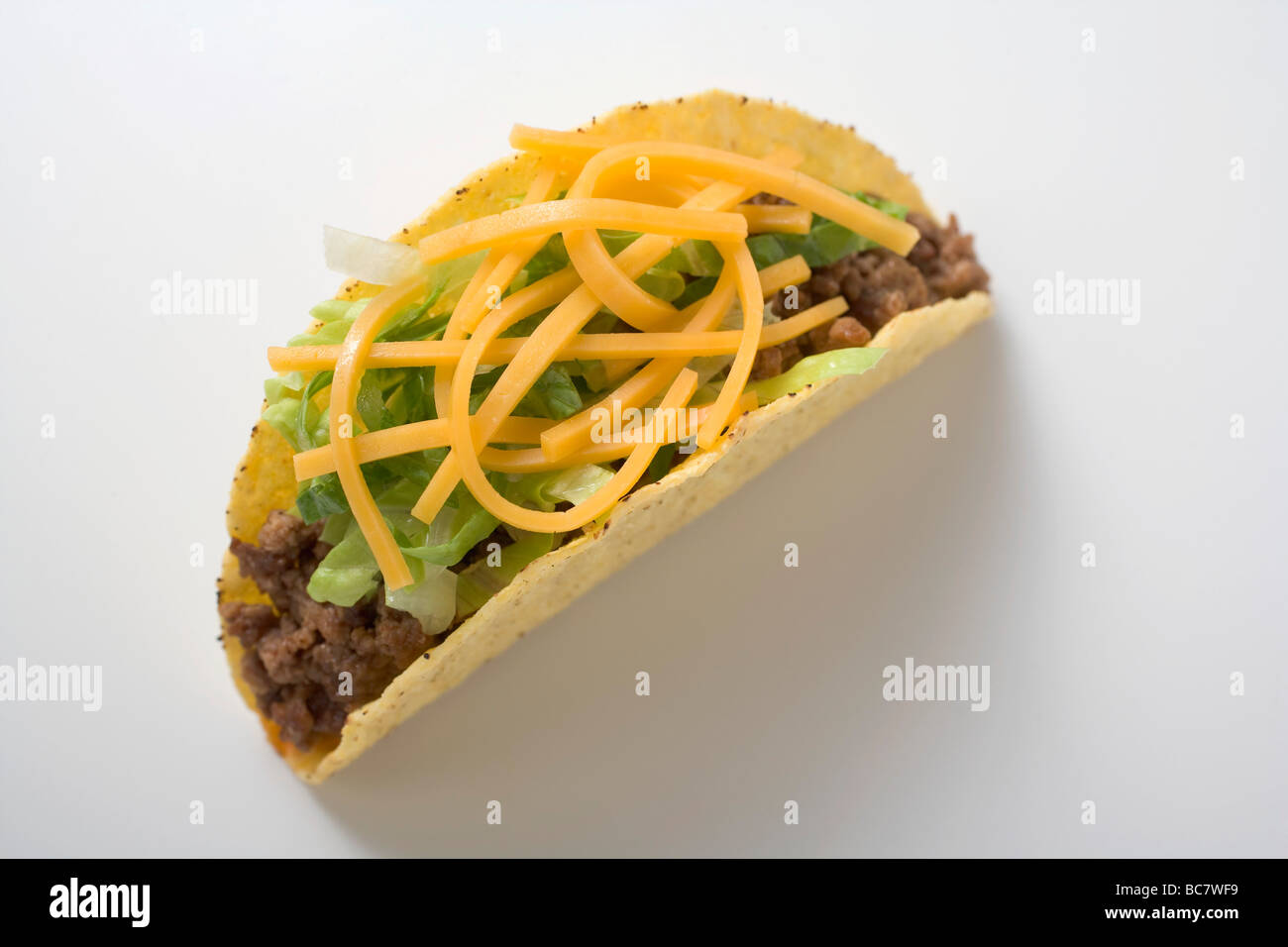 Taco with mince, lettuce and cheese (overhead view Stock Photo - Alamy