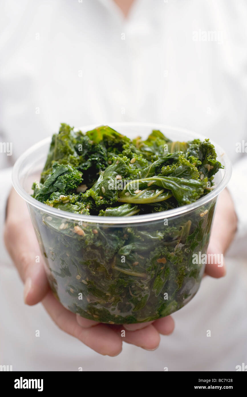 Woman hold kale hi-res stock photography and images - Alamy