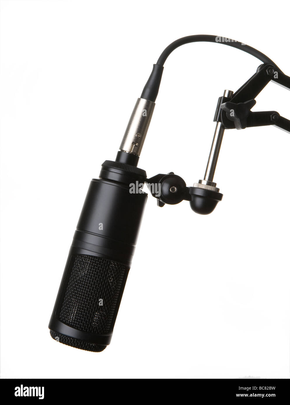 Studio microphone in holder / stand on a white background Stock Photo ...