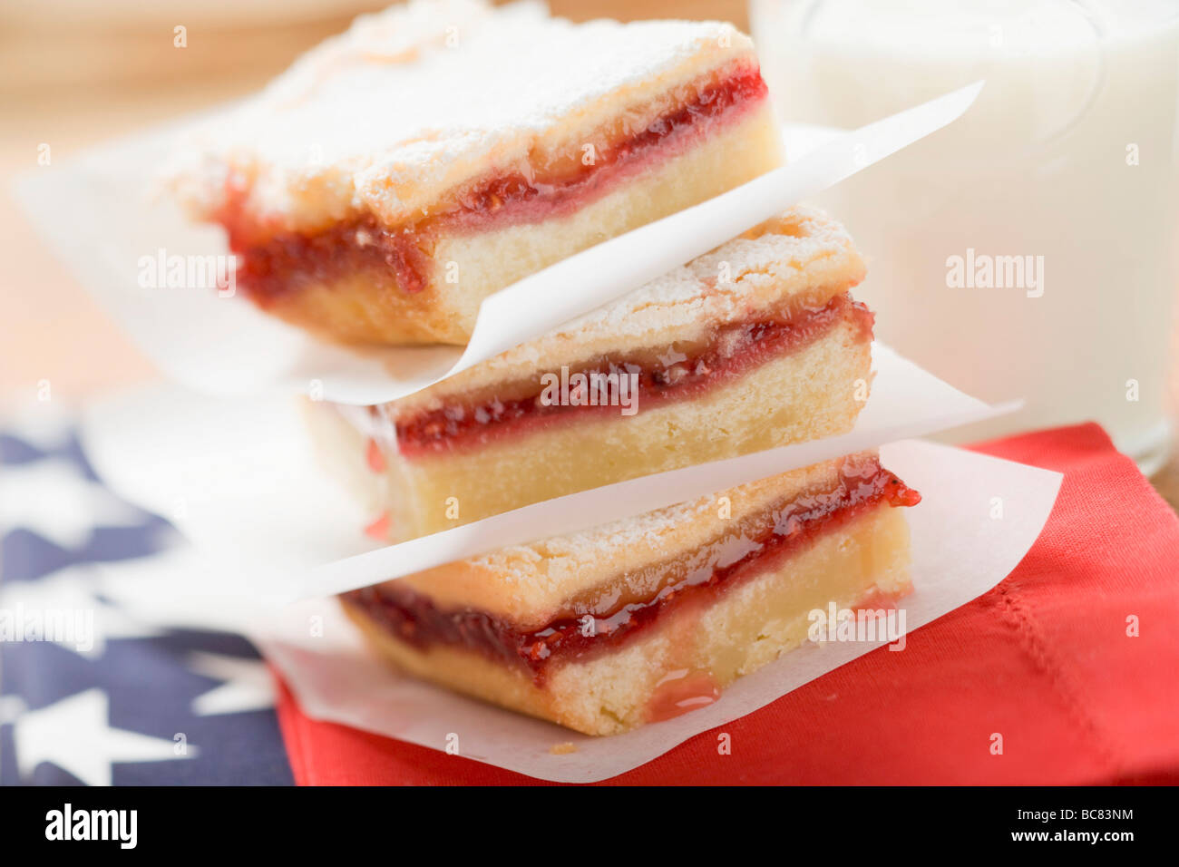 Jam slices with icing sugar, in a pile (USA Stock Photo - Alamy
