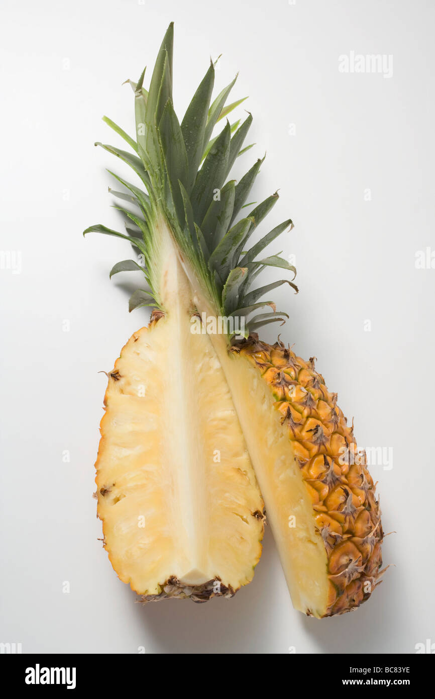 Two pineapple quarters Stock Photo - Alamy