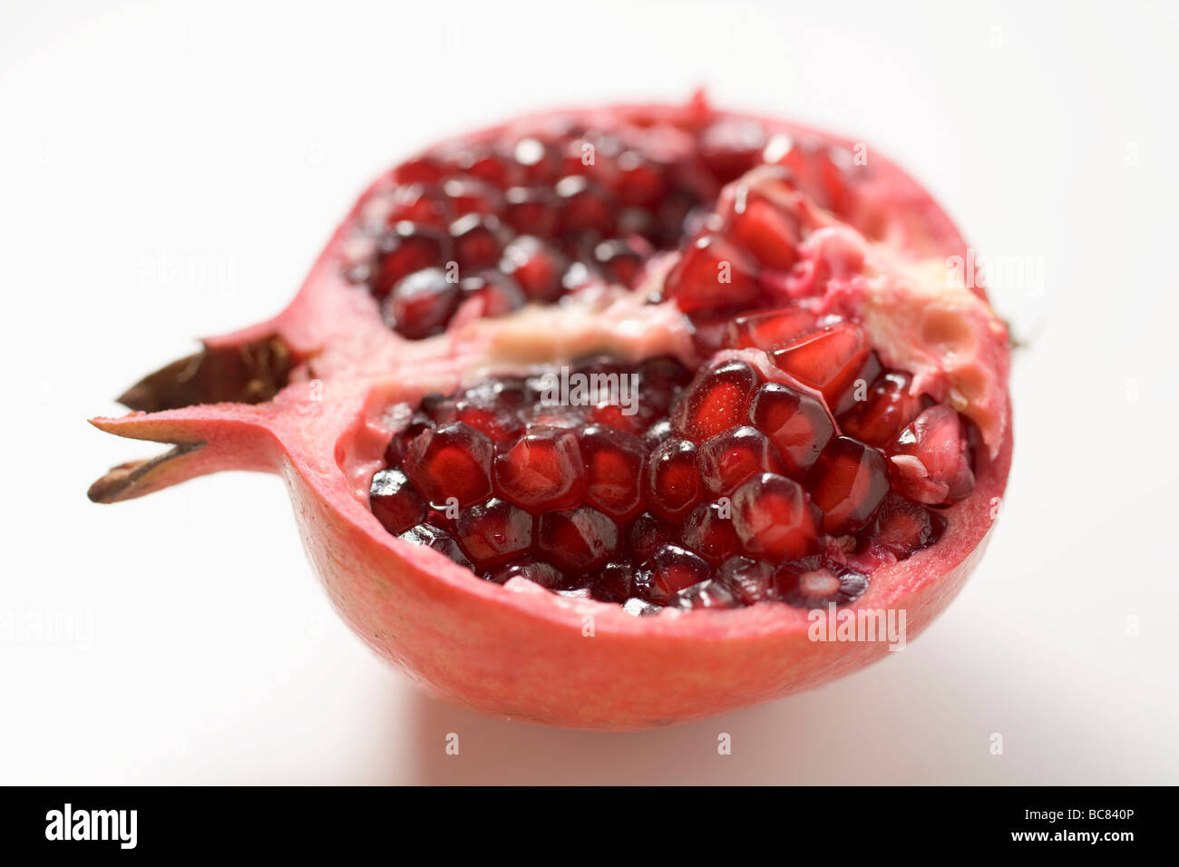Half a pomegranate Stock Photo - Alamy