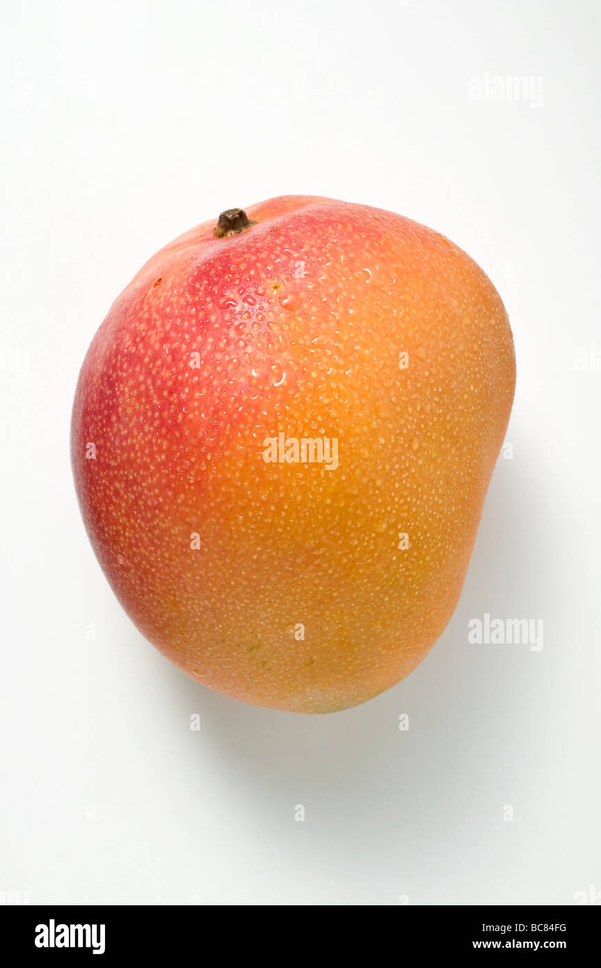 A mango with drops of water Stock Photo - Alamy