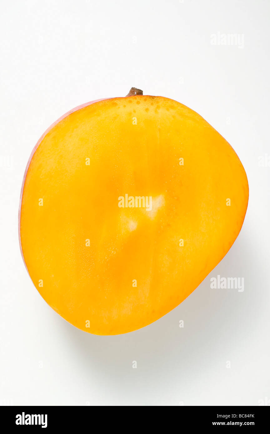 Half a mango Stock Photo - Alamy
