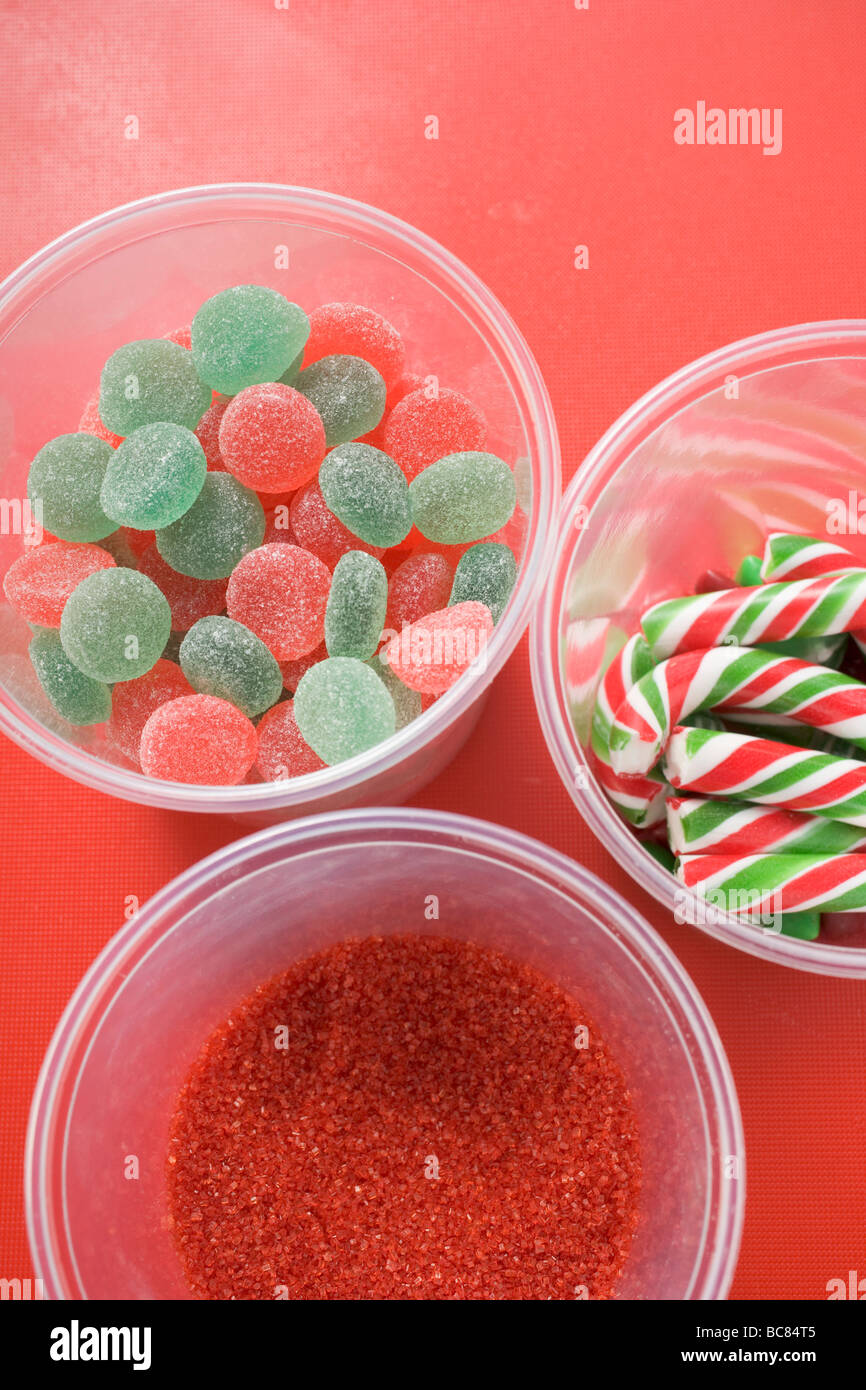 Jelly sweets, candy canes and red sugar Stock Photo - Alamy