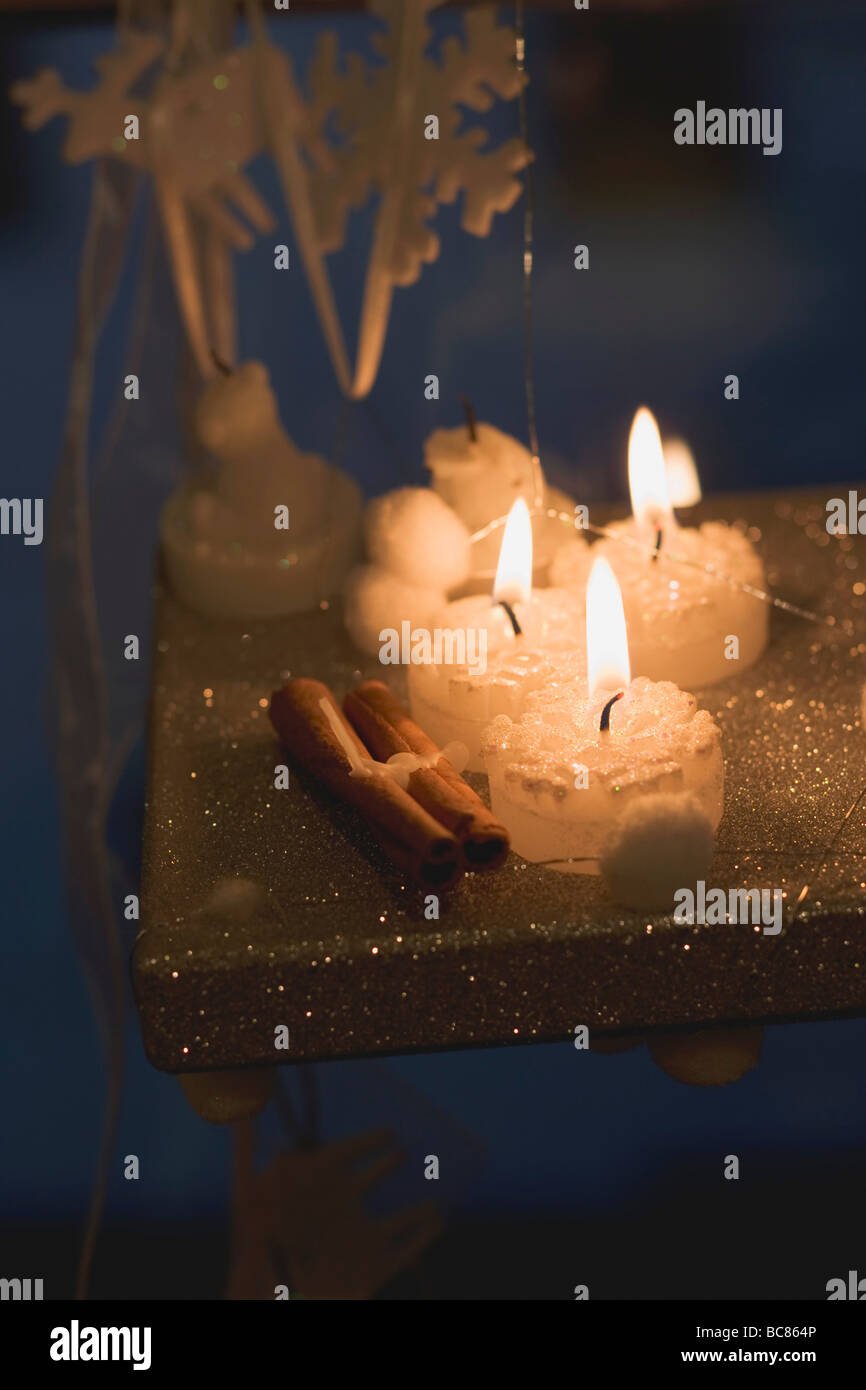 Assorted candles and Christmas decorations Stock Photo - Alamy