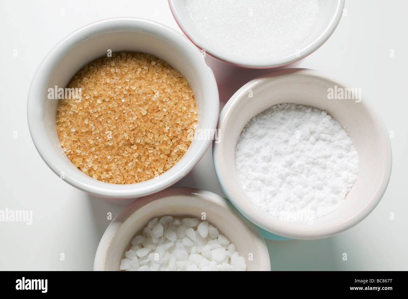 Four different types of sugar Stock Photo - Alamy