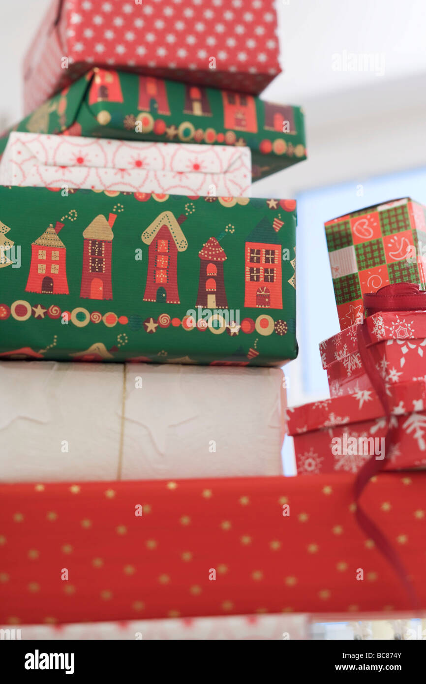 A pile of Christmas gifts, in boxes Stock Photo - Alamy