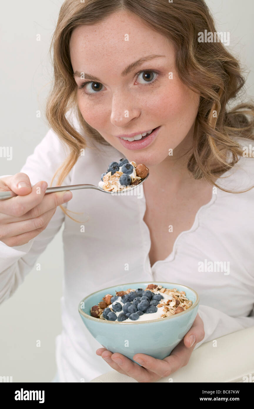 Woman Blueberries Looking At Camera High Resolution Stock Photography ...