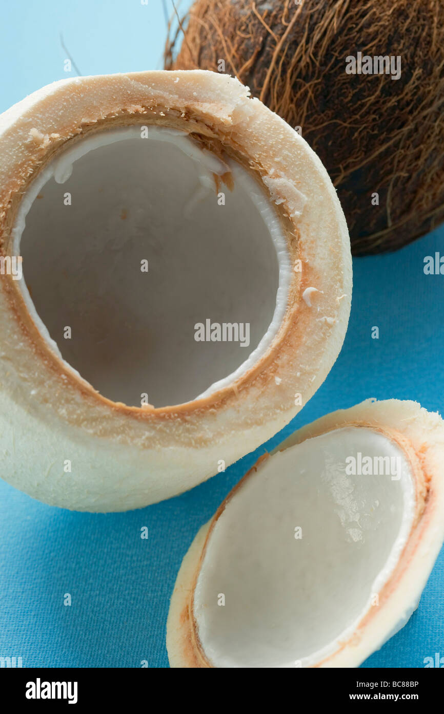 Unshelled coconuts hi-res stock photography and images - Alamy