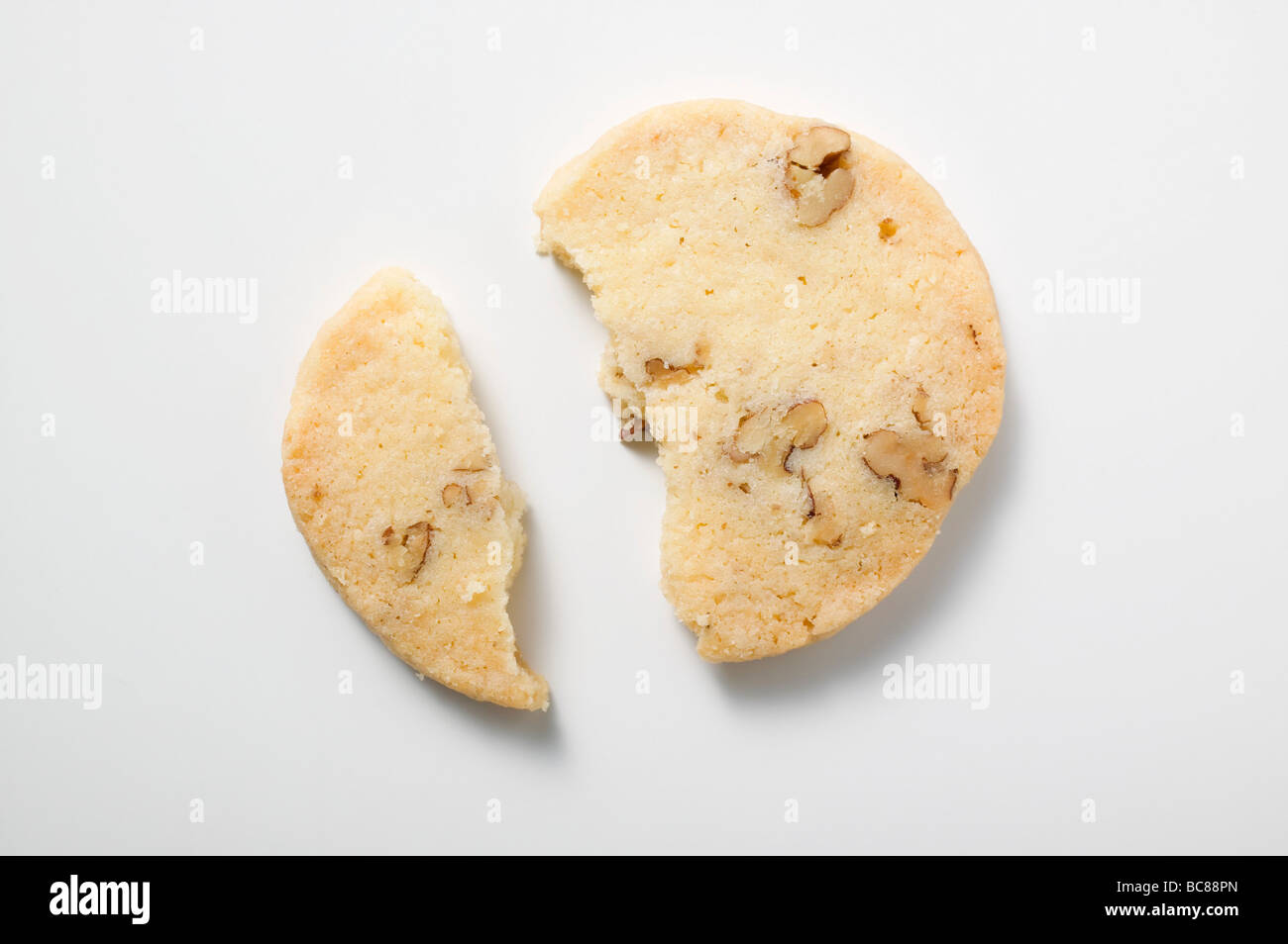 A nut biscuit, broken Stock Photo - Alamy