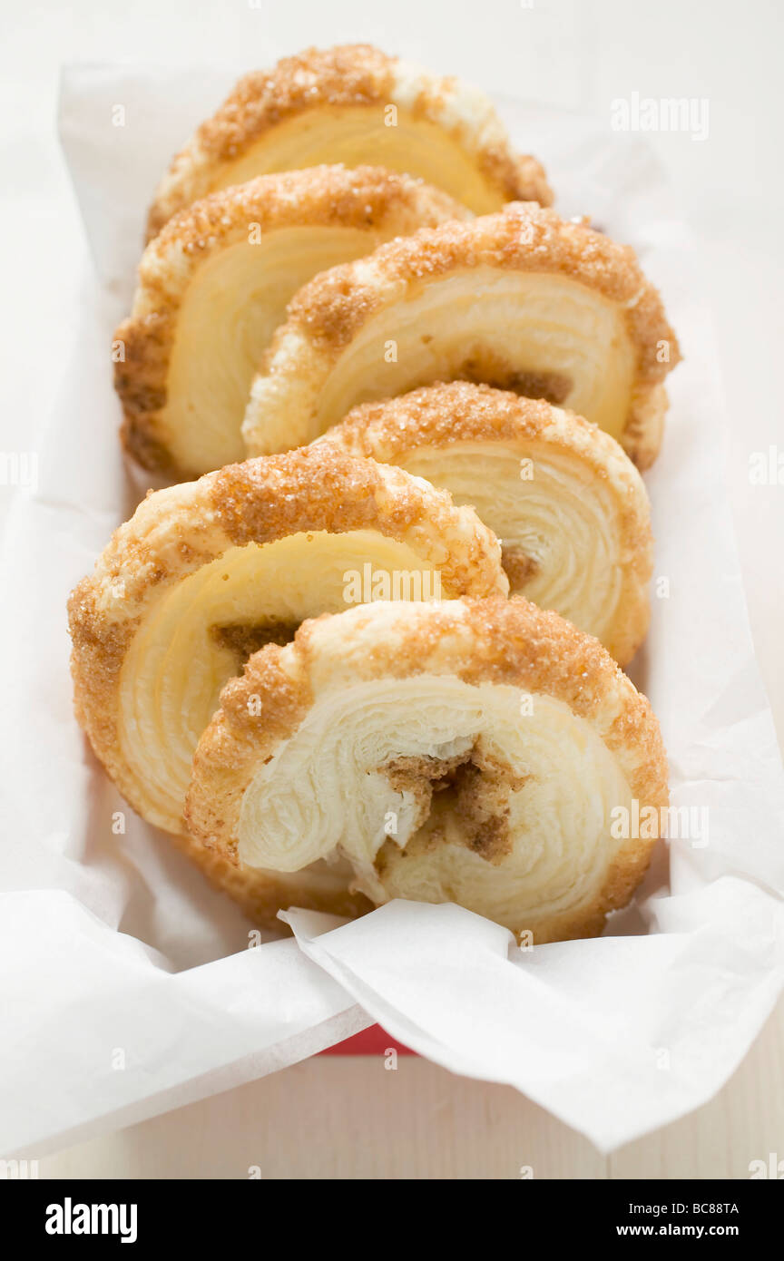 Palmiers (puff pastry biscuits) in box Stock Photo - Alamy