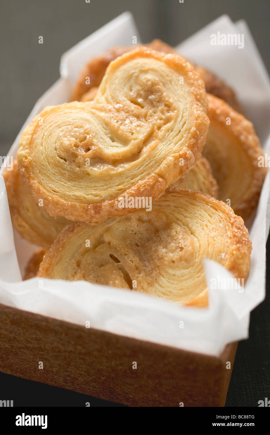 Palmiers (puff pastry biscuits) in box Stock Photo - Alamy