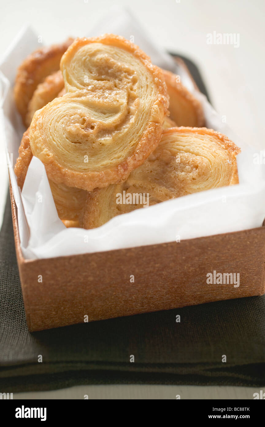 Palmiers (puff pastry biscuits) in box Stock Photo - Alamy