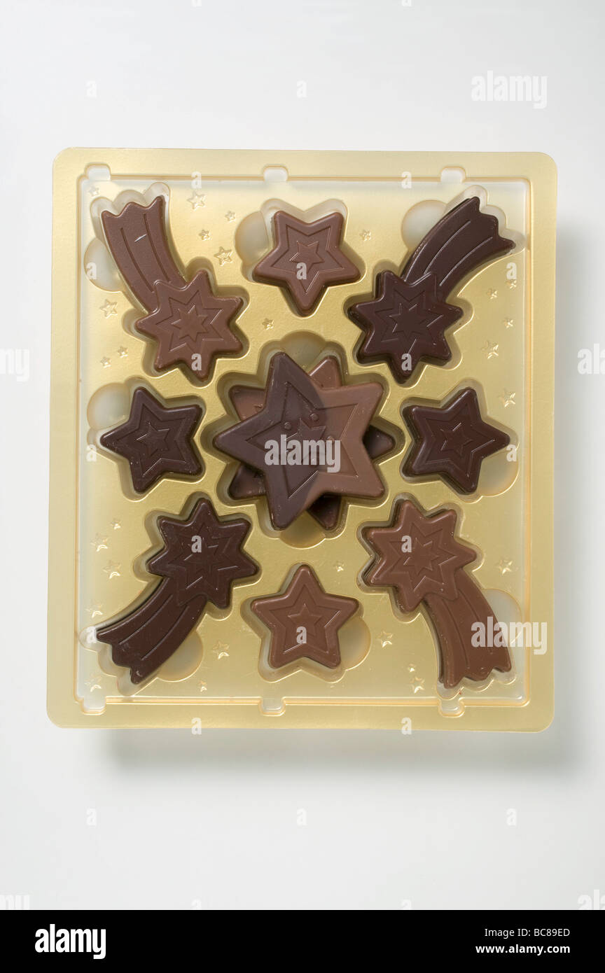 Chocolate stars in plastic packaging Stock Photo - Alamy