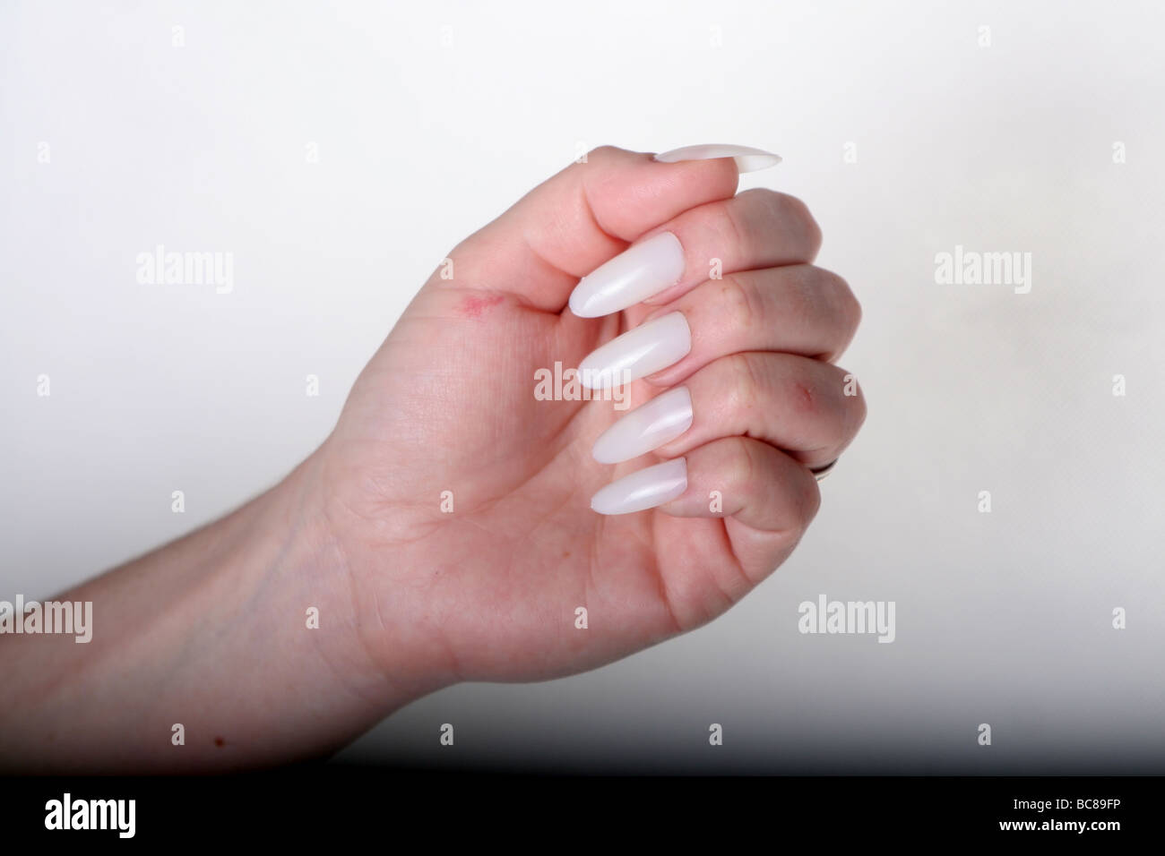 Fingernail extension hi-res stock photography and images - Alamy