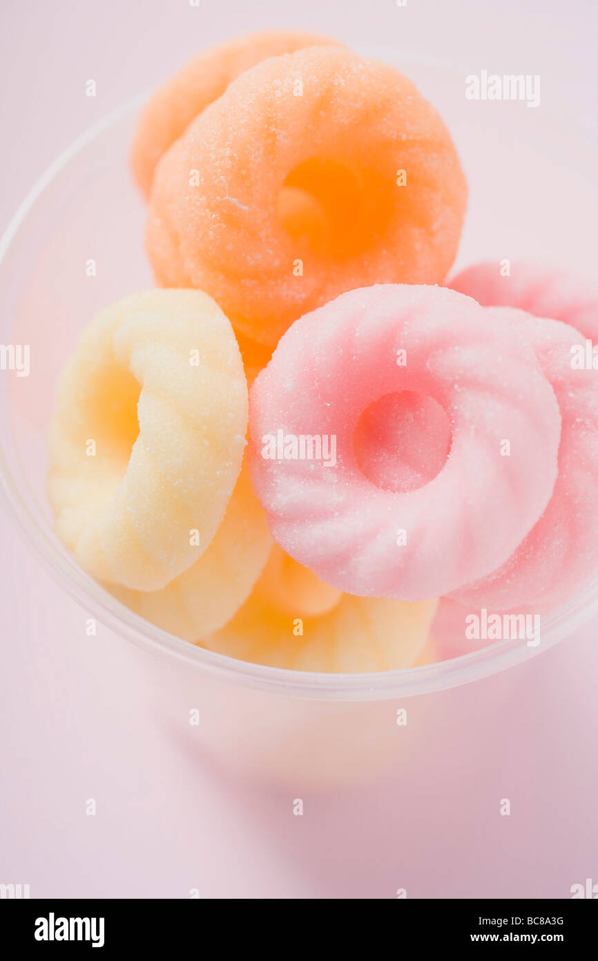Sugar rings in plastic cup Stock Photo - Alamy