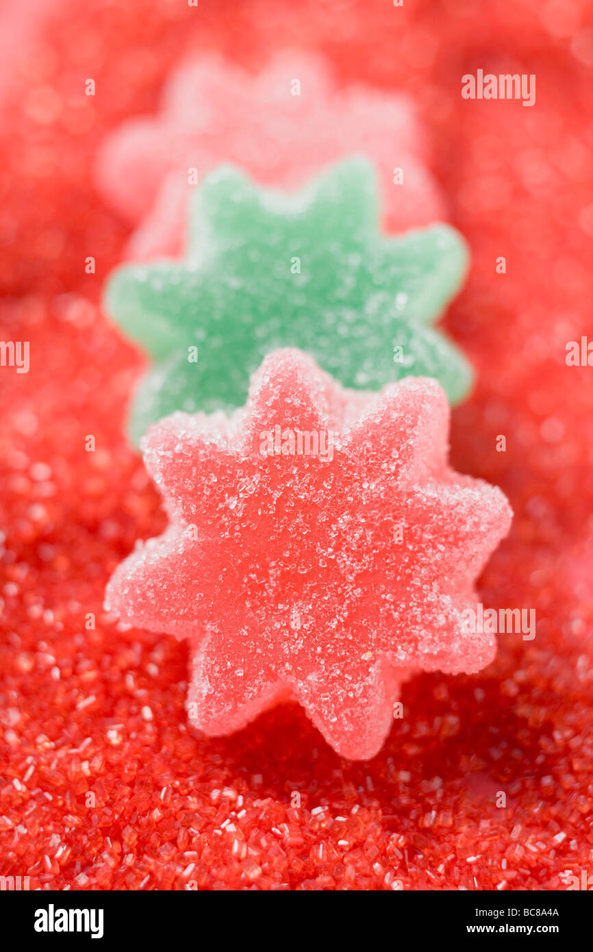 Jelly stars on red sugar Stock Photo - Alamy