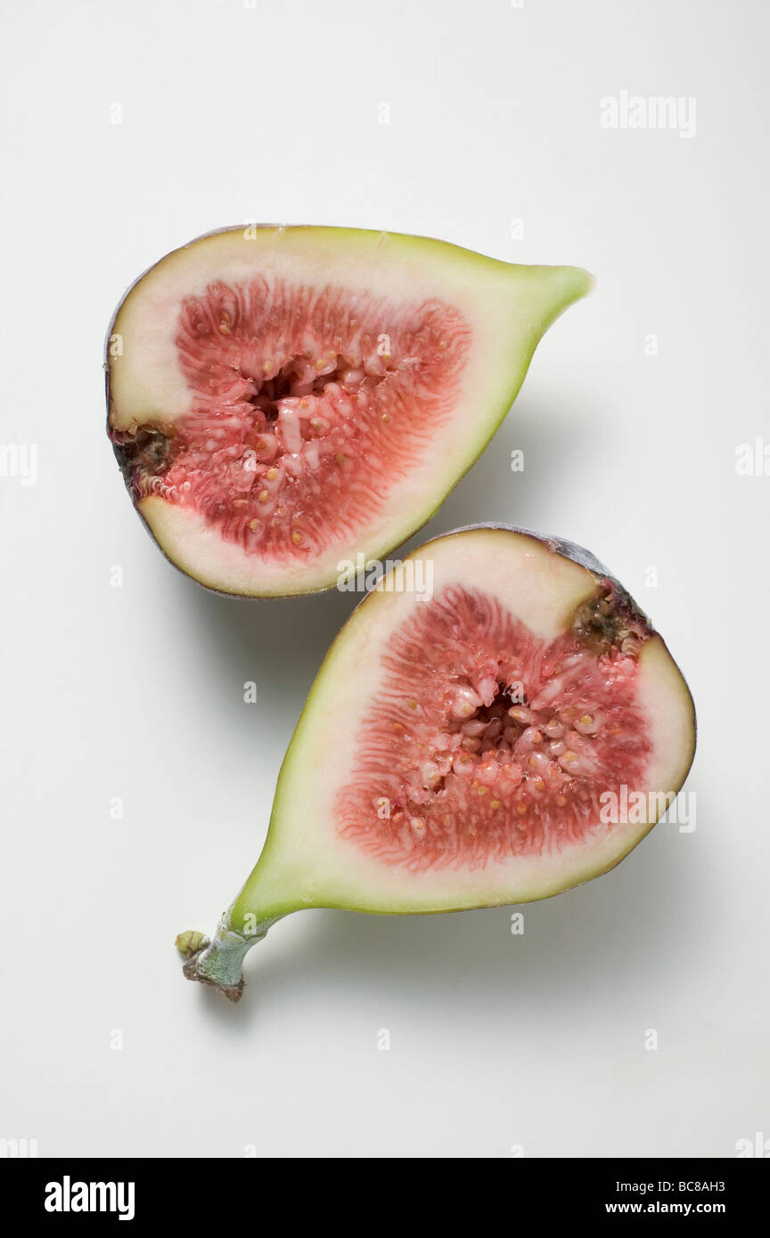 Two fig halves Stock Photo - Alamy