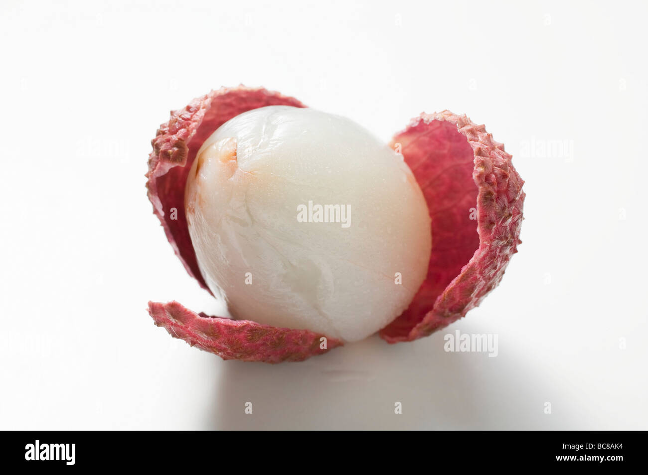 Lychee, with opened peel Stock Photo - Alamy