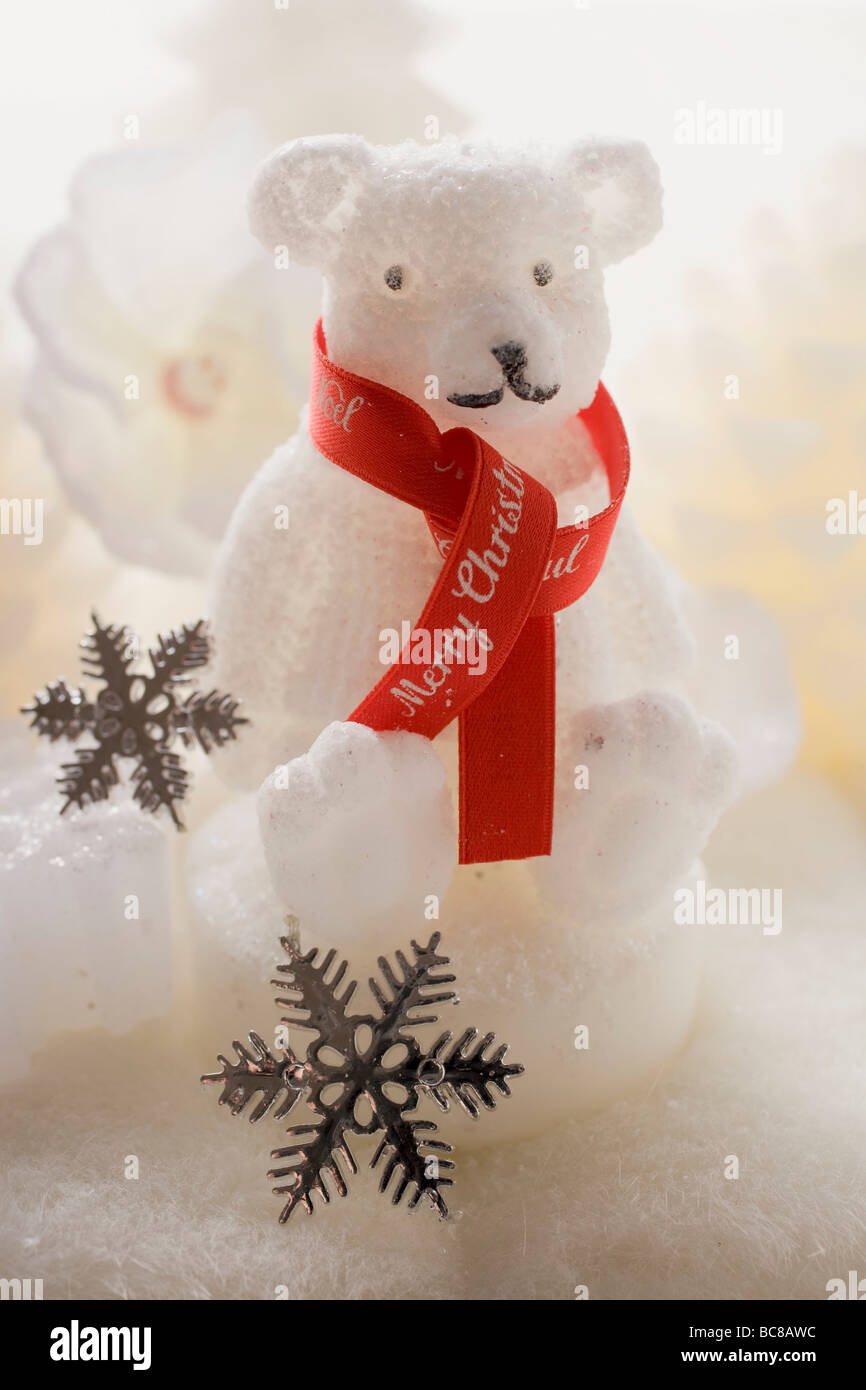 Polar bear candle with ribbon Stock Photo - Alamy