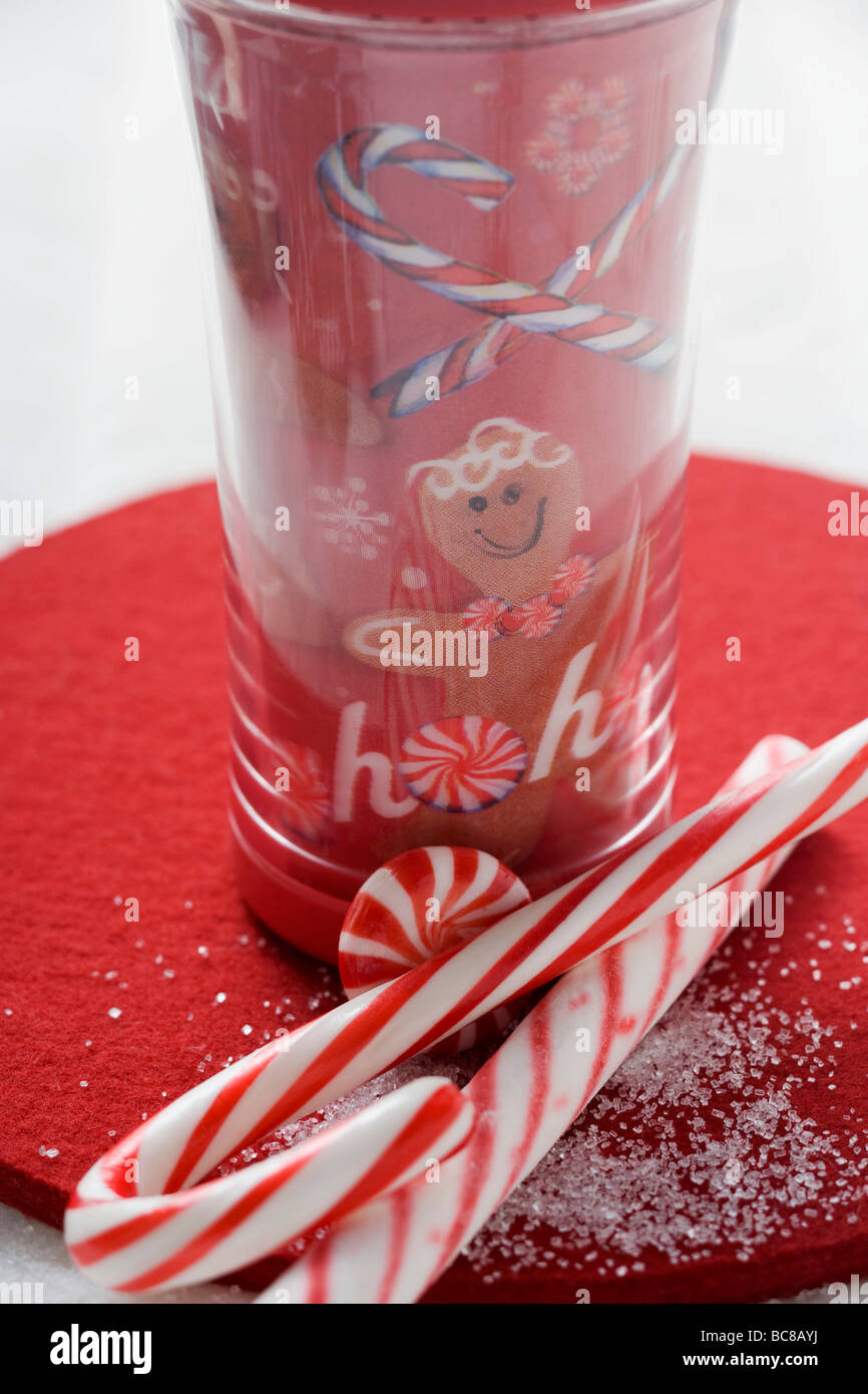 Sweets in front of festive glass Stock Photo - Alamy