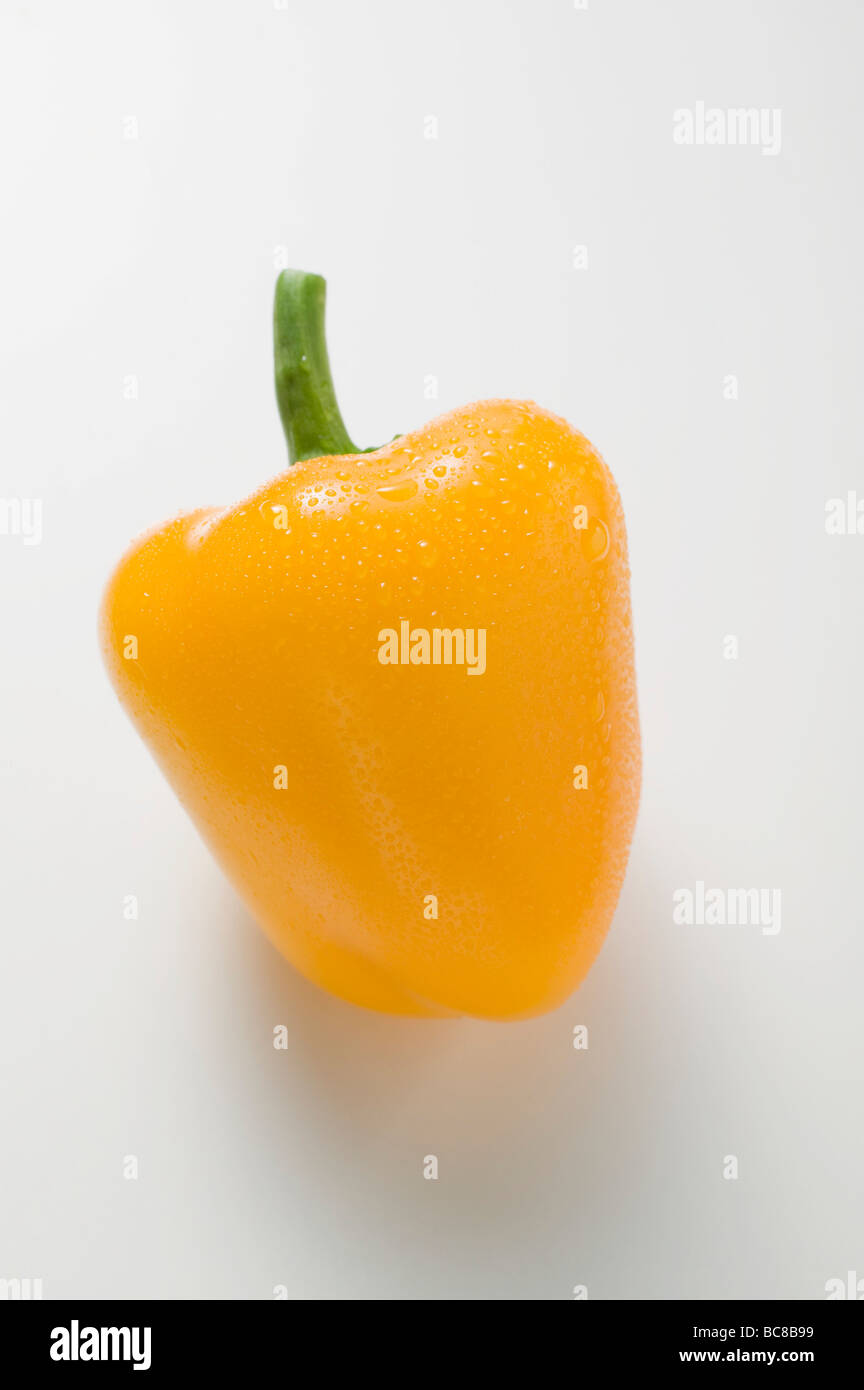 Yellow pepper with drops of water Stock Photo - Alamy