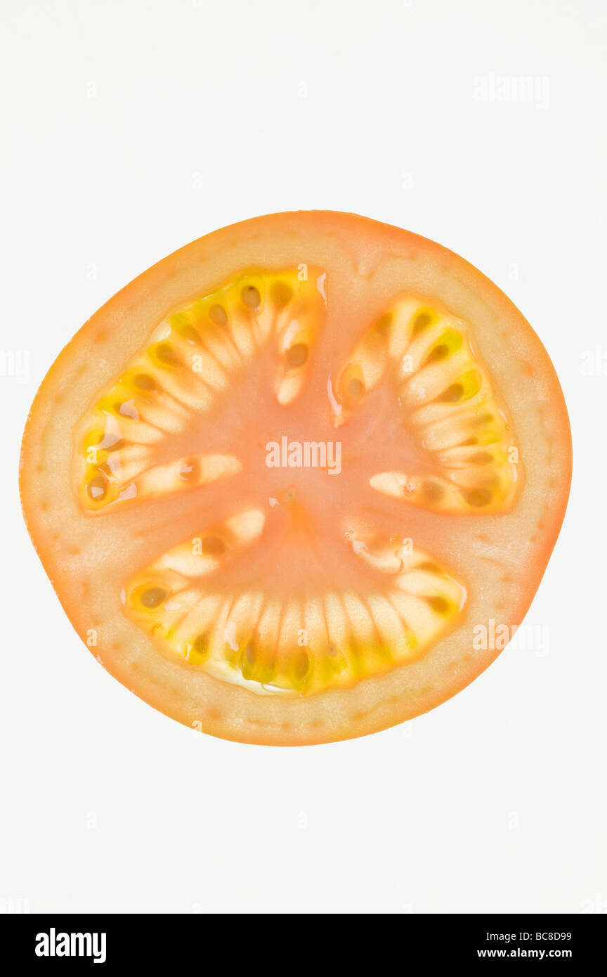 A slice of tomato from above Stock Photo - Alamy
