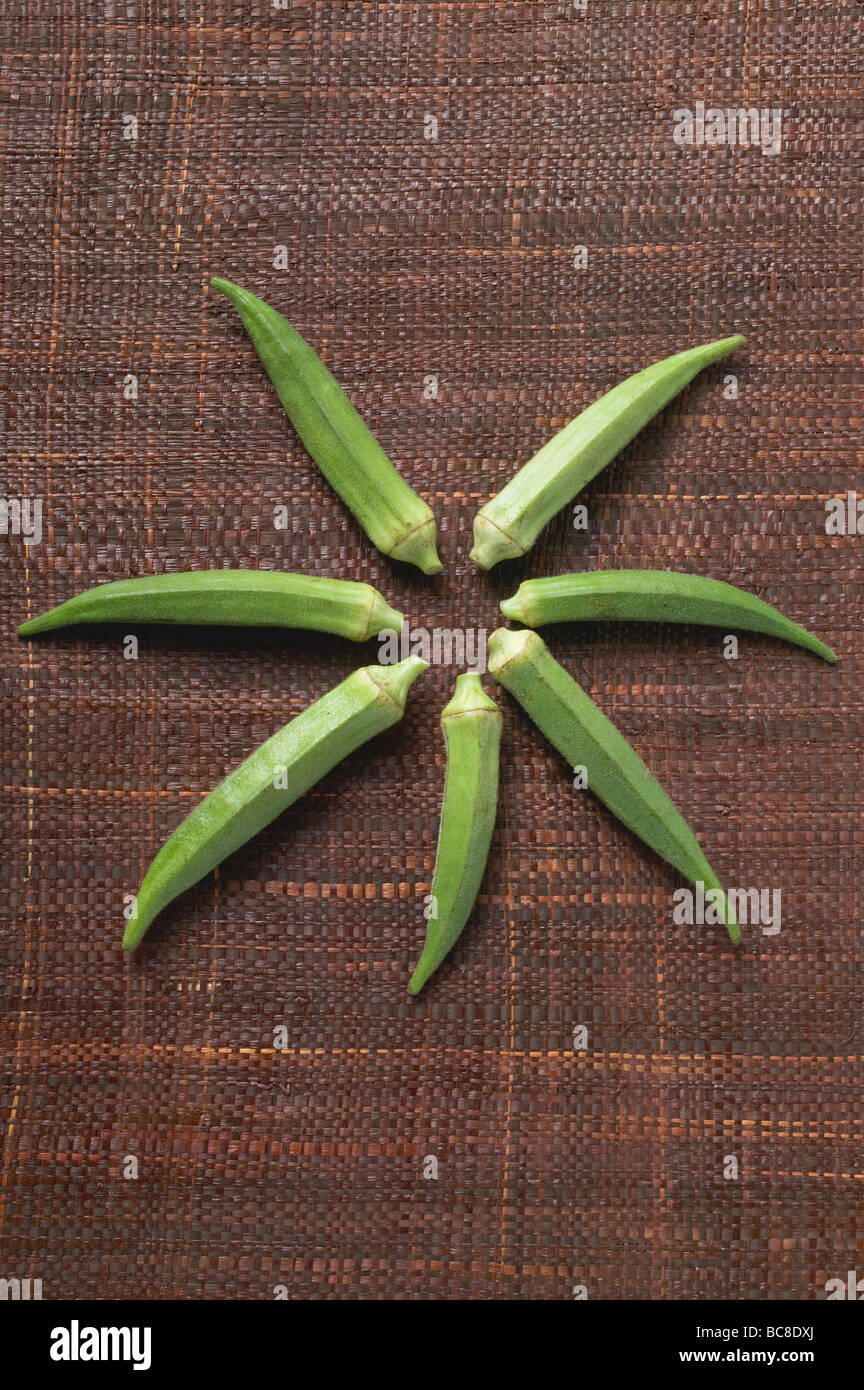 Seven okra pods arranged in a star shape Stock Photo - Alamy