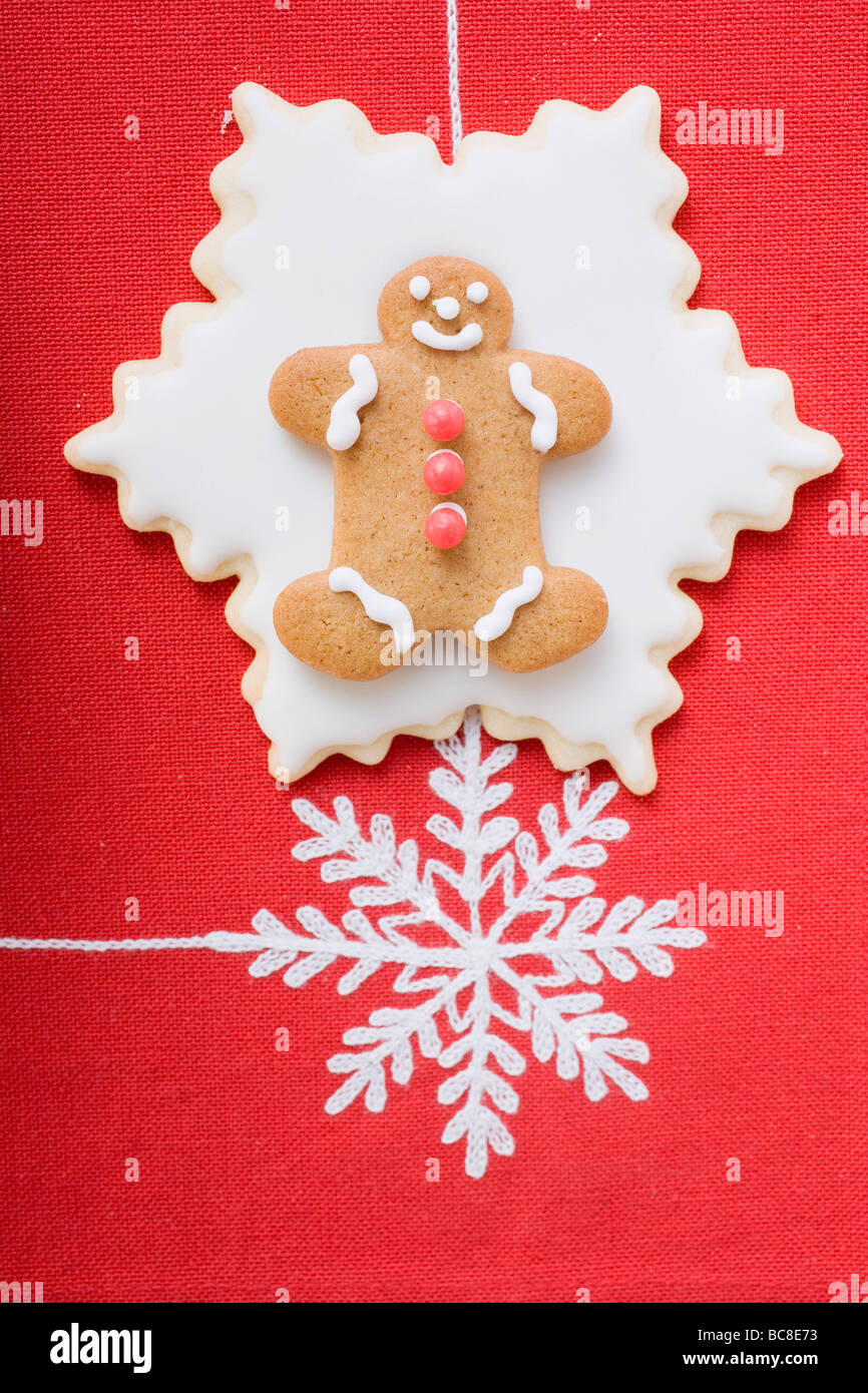Gingerbread man on star biscuit Stock Photo - Alamy