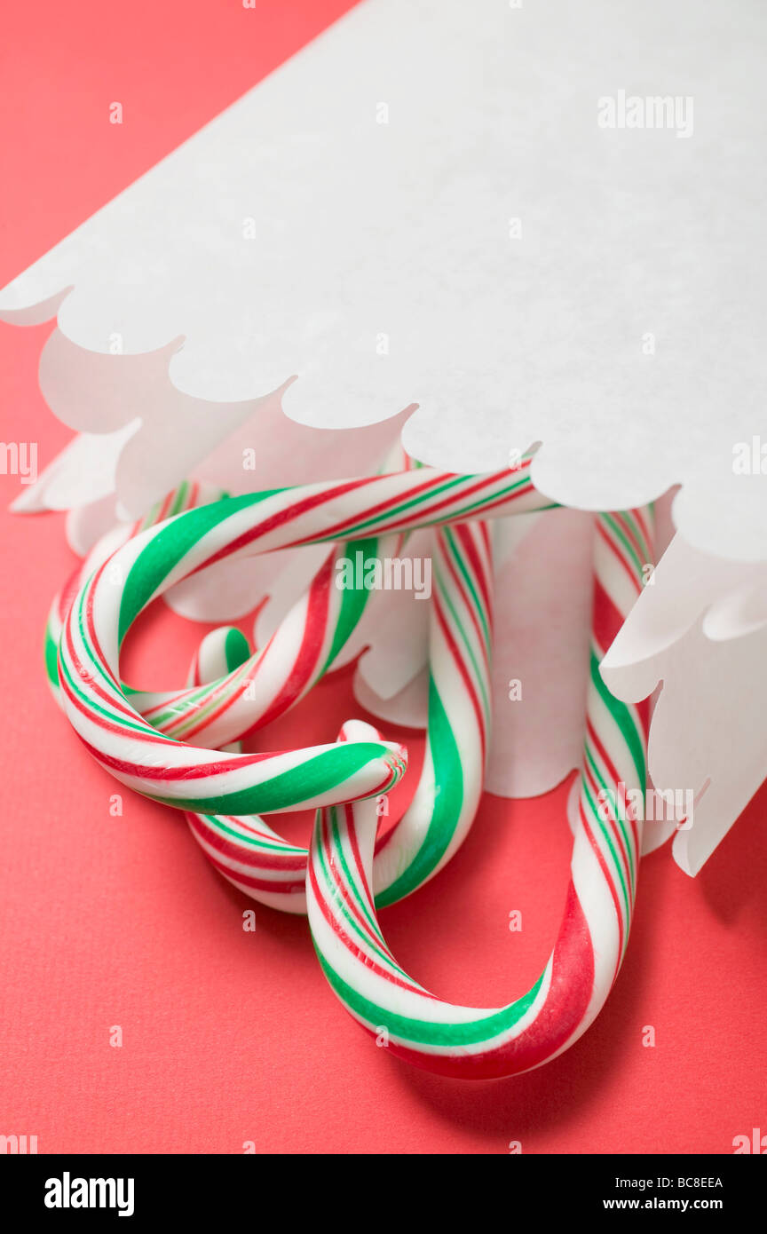 Candy canes in paper bag Stock Photo - Alamy