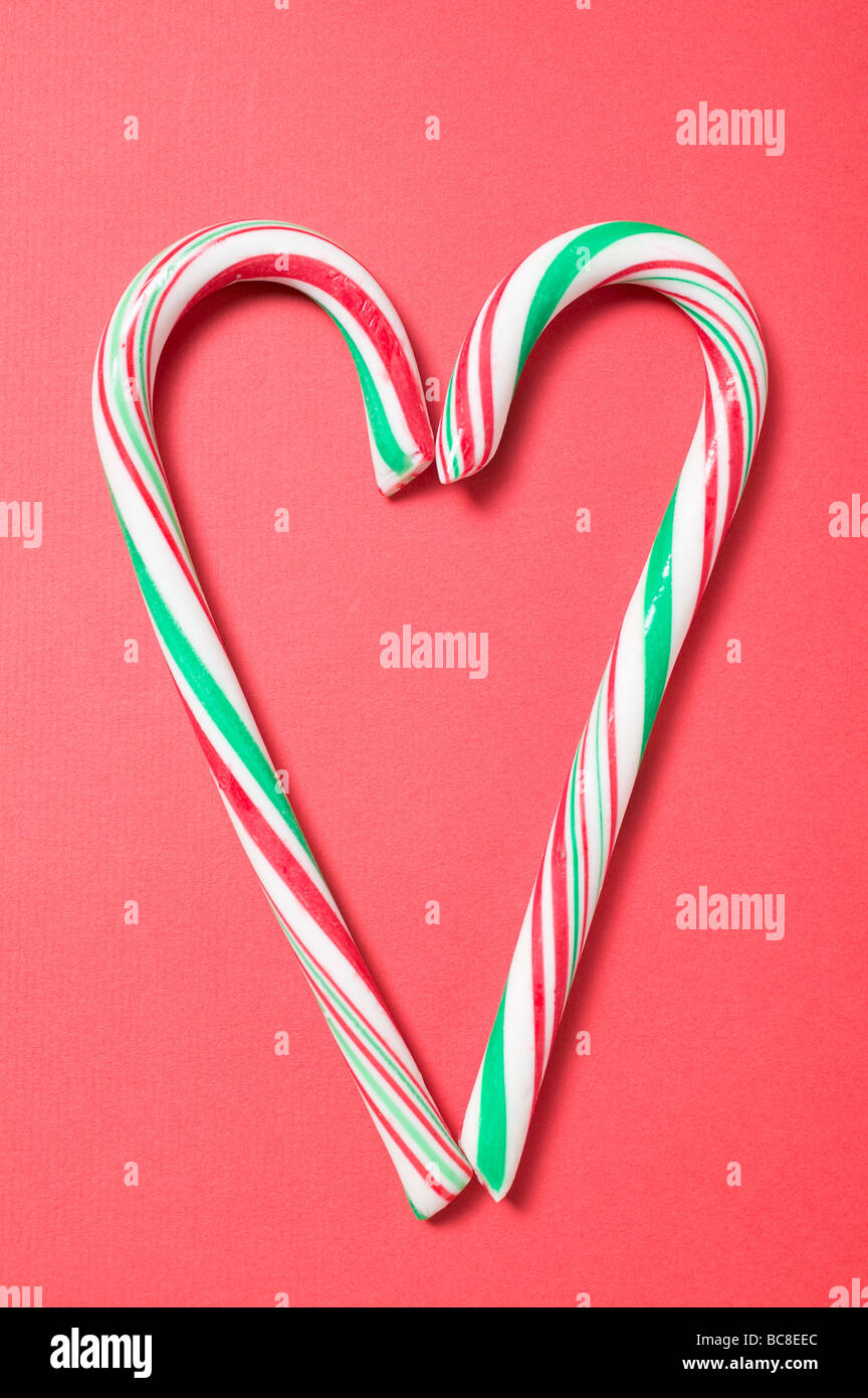 Two candy canes forming a heart Stock Photo - Alamy