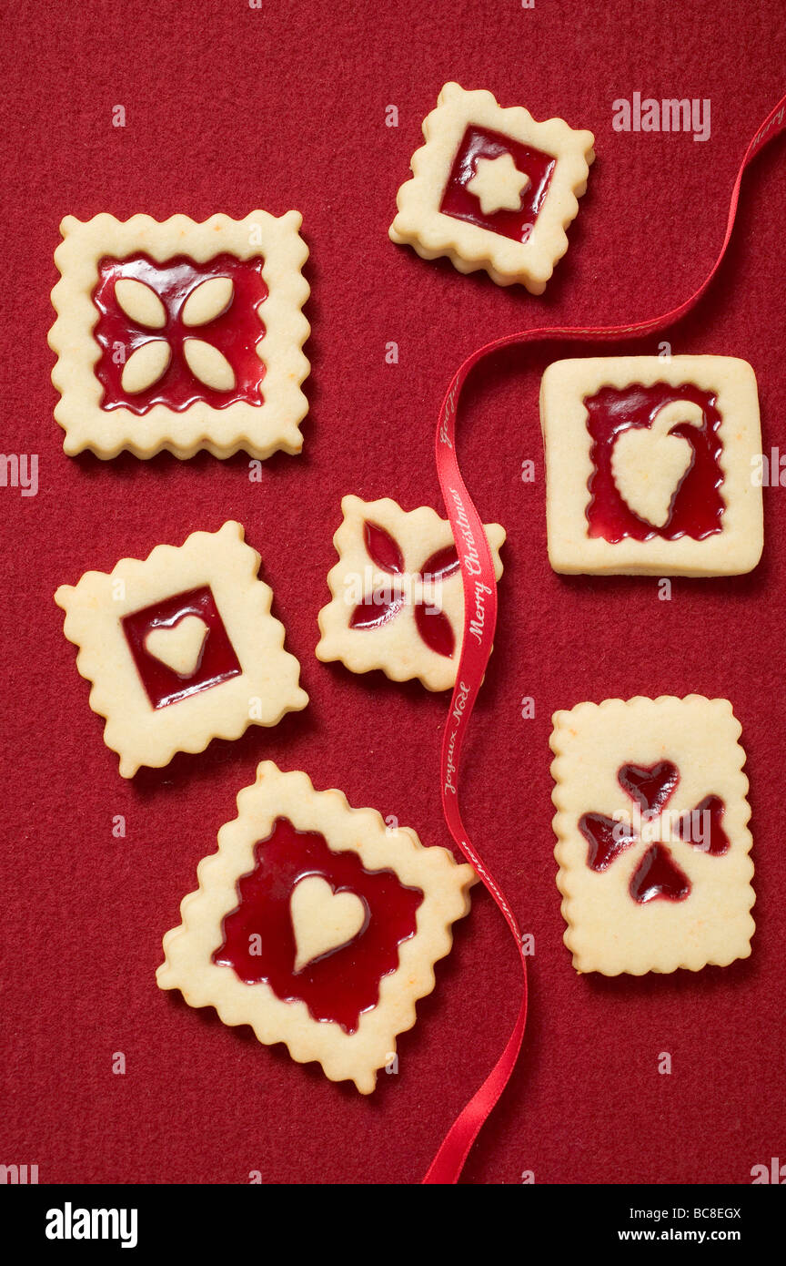 Seven square jam biscuits with red ribbon Stock Photo - Alamy