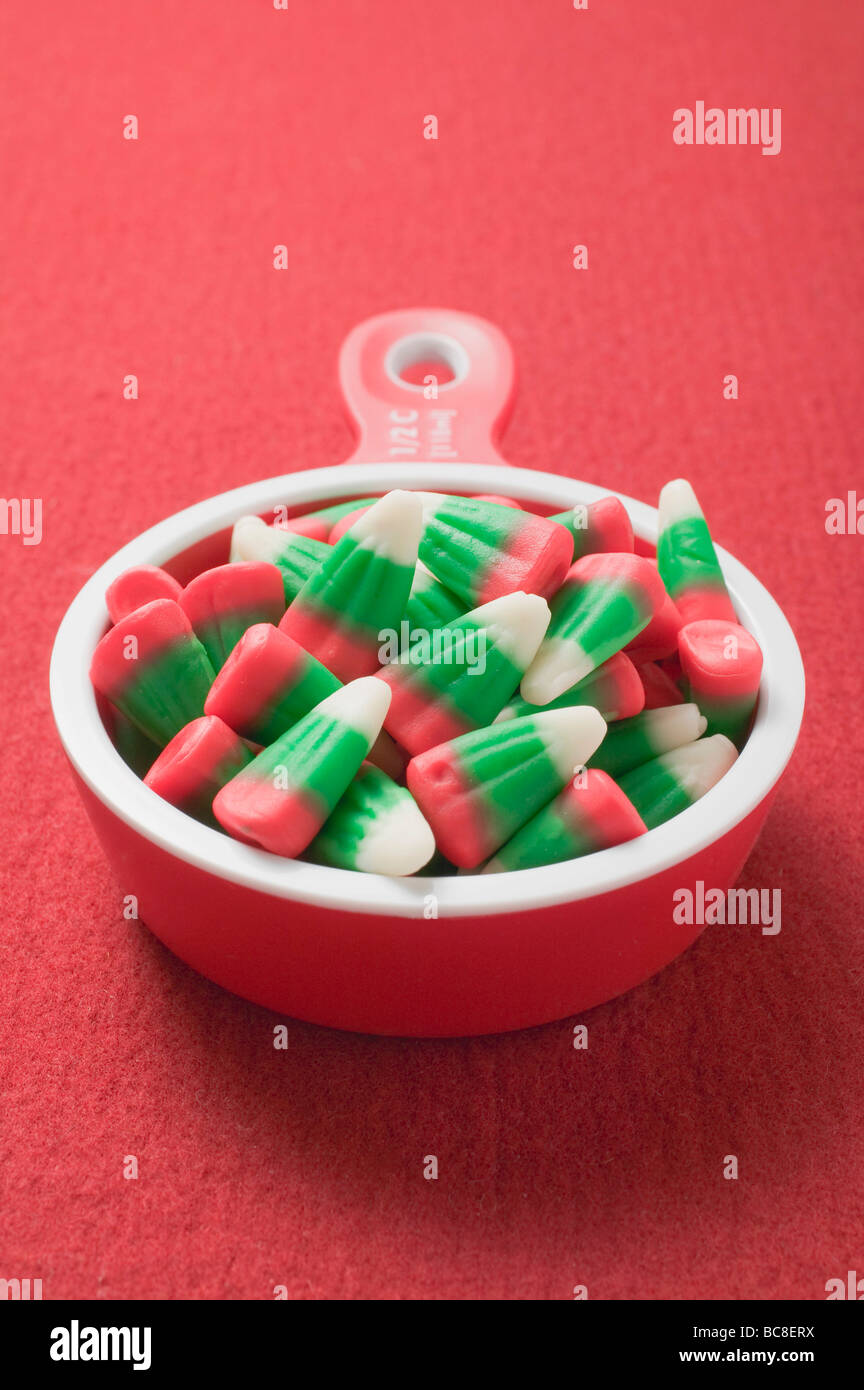 Candy corn in measuring cup (Christmas Stock Photo - Alamy