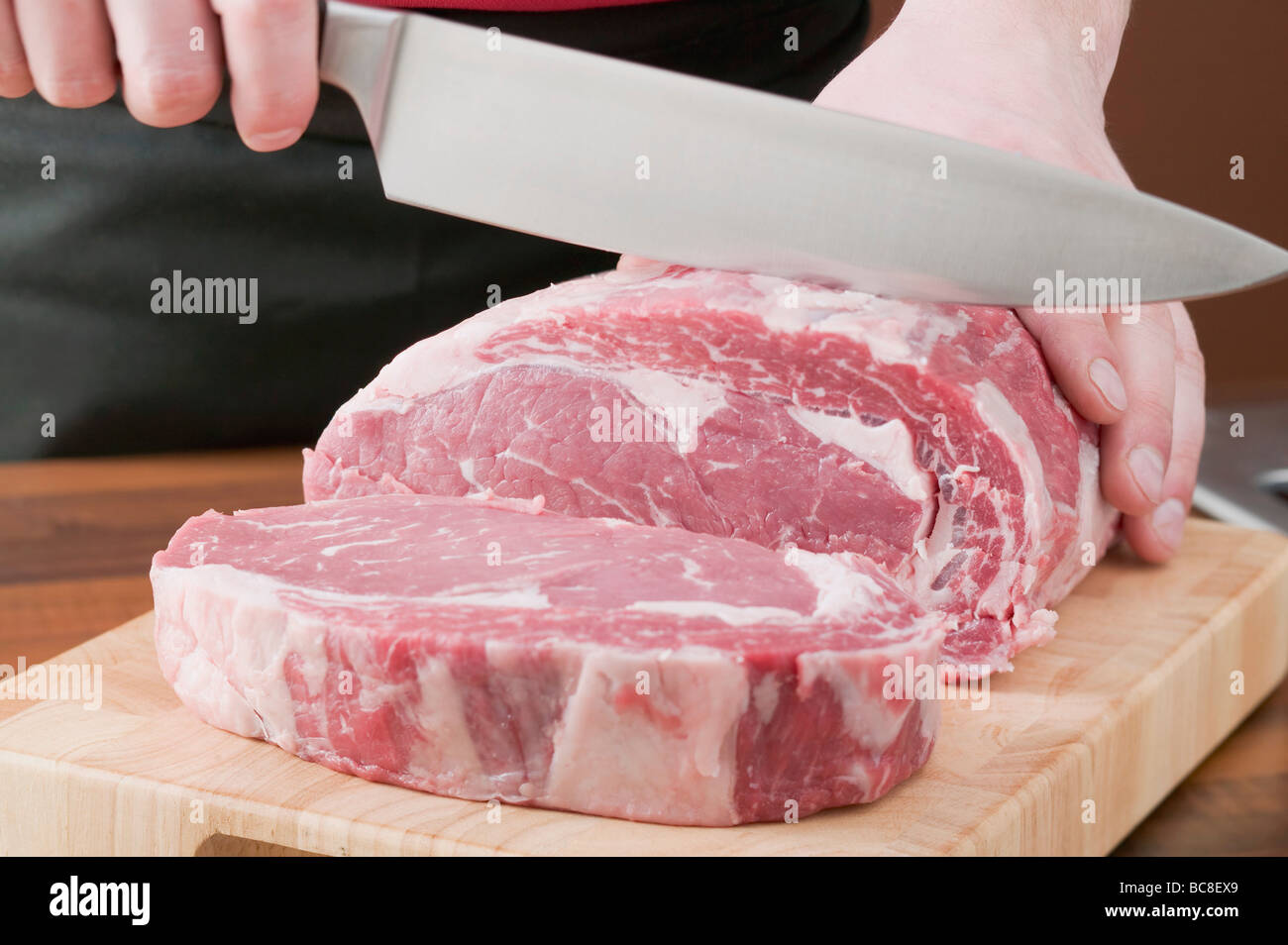 Slicing beef Stock Photo - Alamy