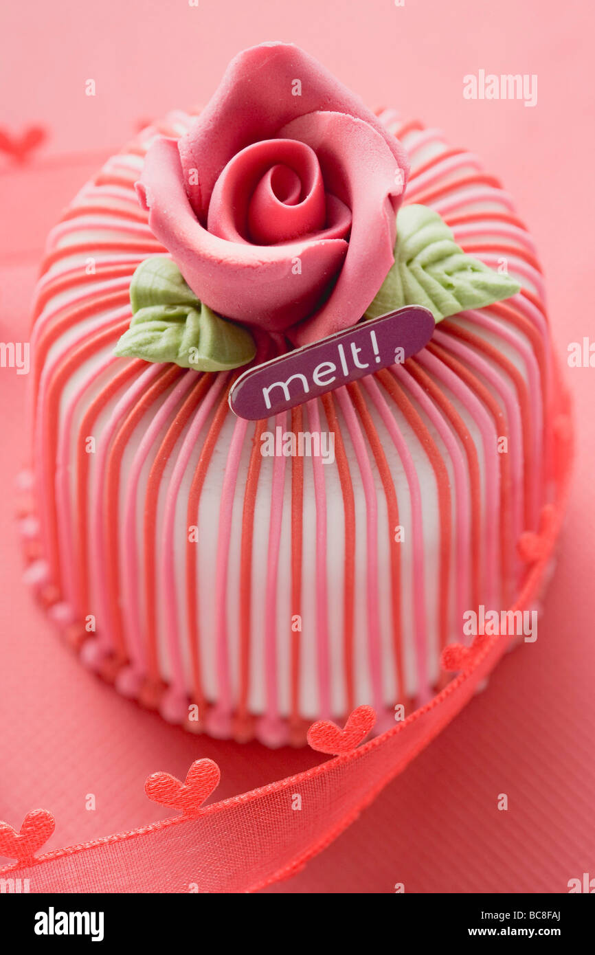 Marzipan cake with red ribbon Stock Photo - Alamy