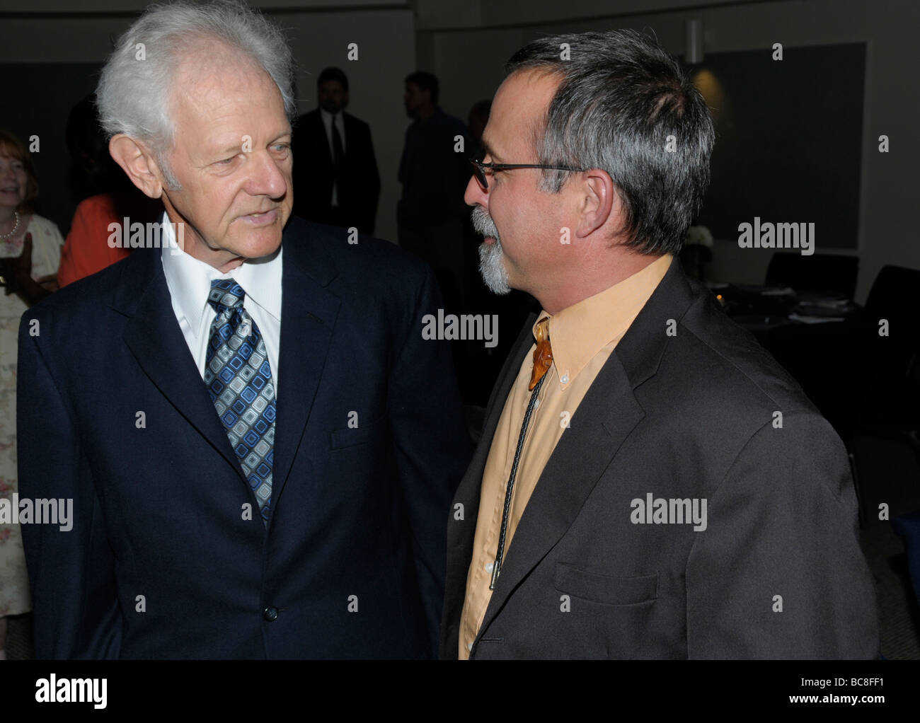 2 men talking Stock Photo - Alamy