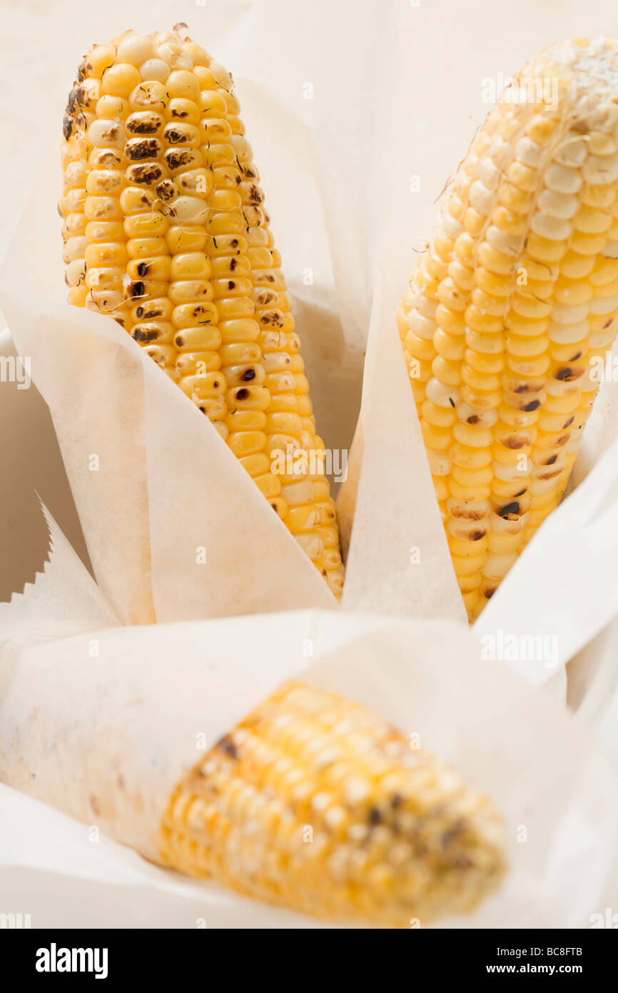 Grilled corn on the cob in greaseproof paper Stock Photo - Alamy