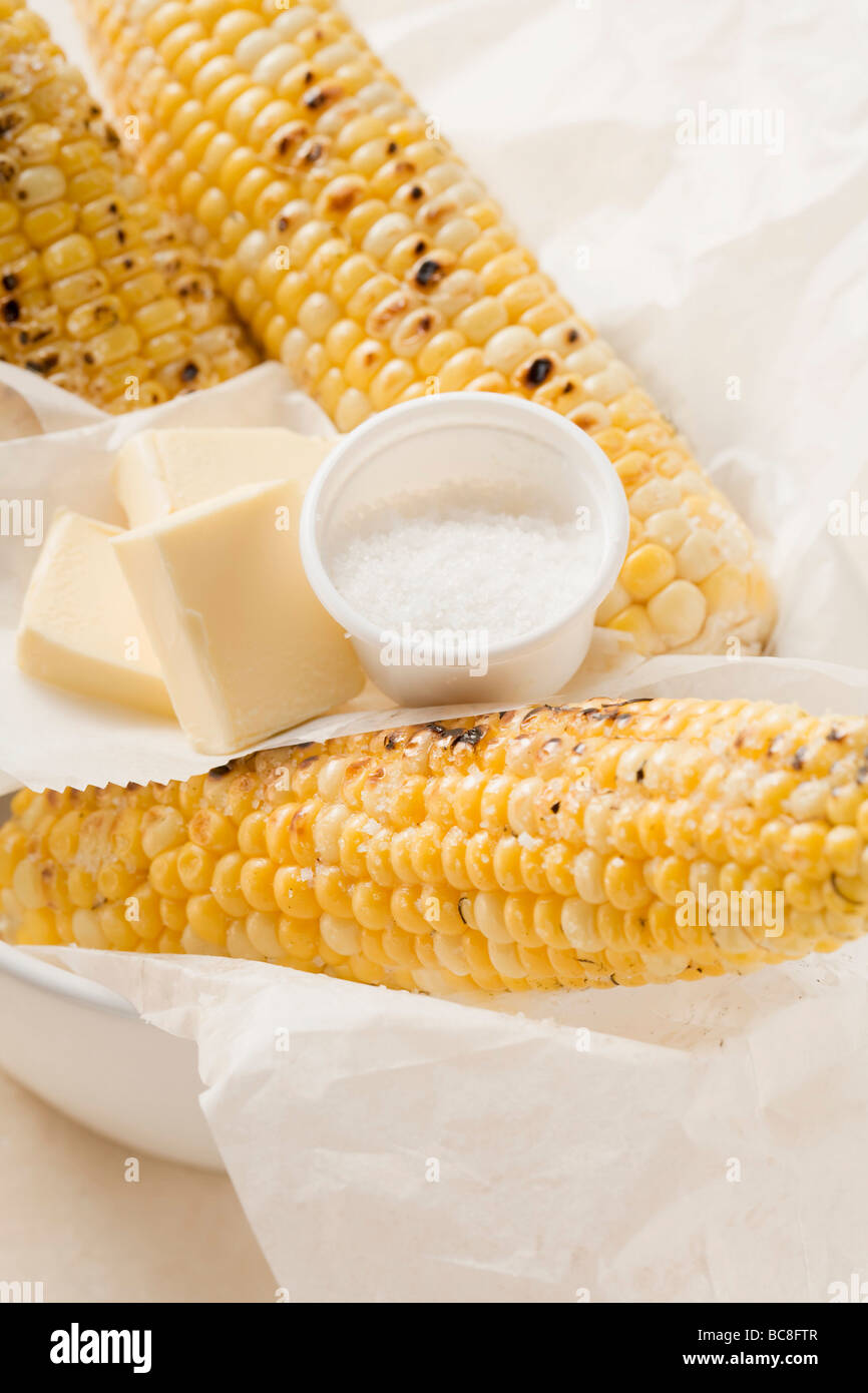Grilled corn on the cob with salt and pieces of butter Stock Photo - Alamy