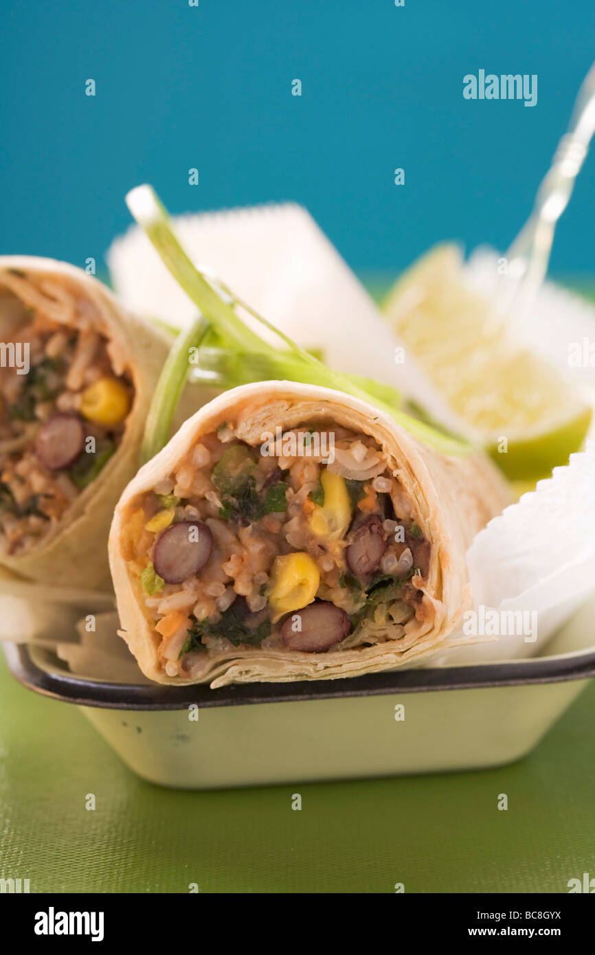Bean burritos with lime Stock Photo - Alamy